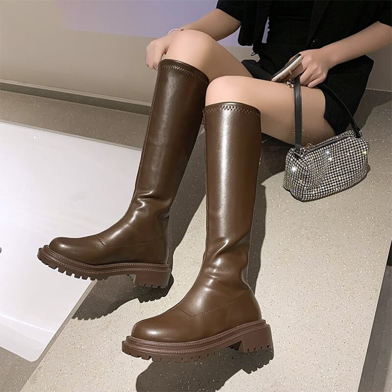 Woman's long boots Styco